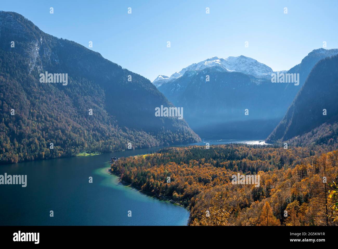 Panoramic view of the Königssee, autumnal forest and snow-covered ...