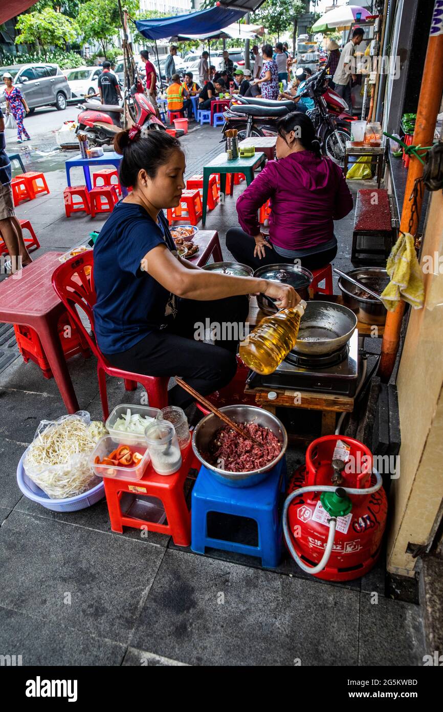 Two Women Cooks Get Set-Up to Prepare Street Food Entrees for Lunch ...