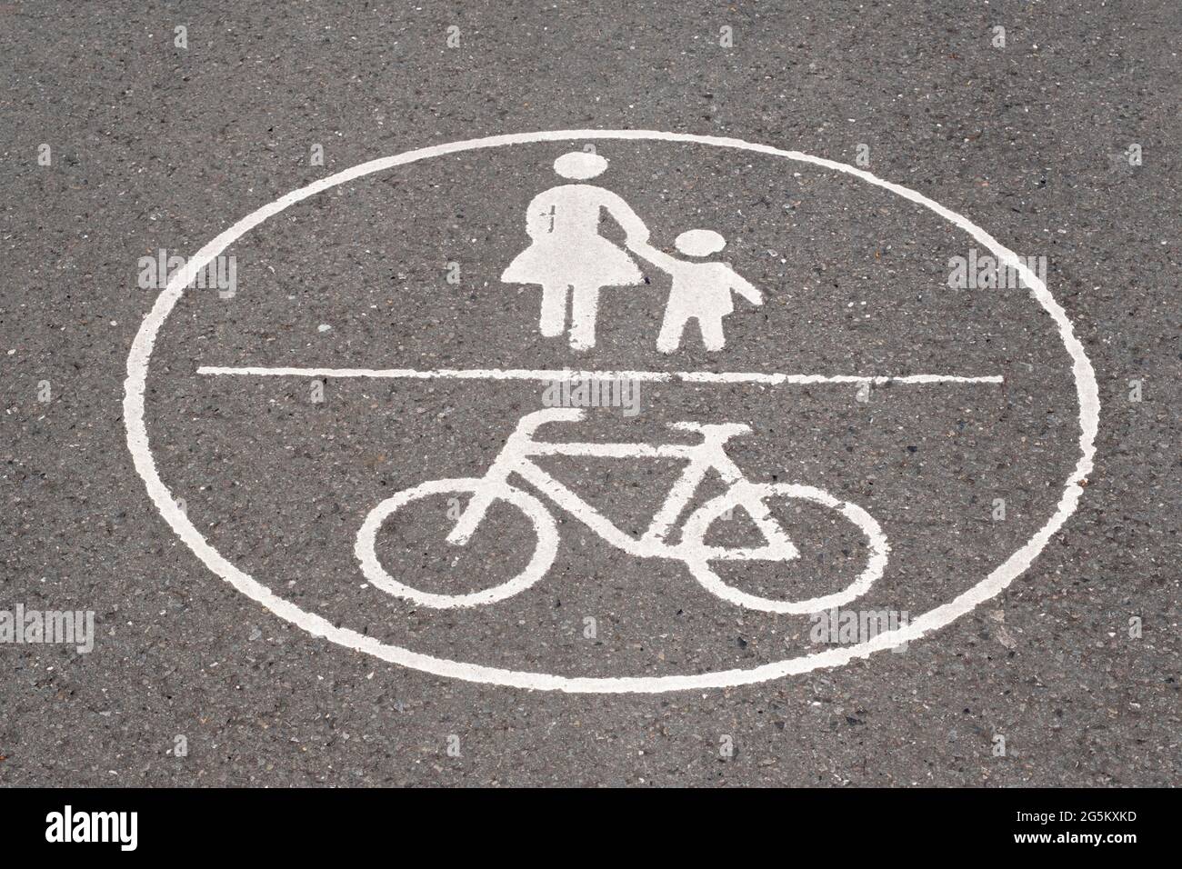 Common footpath and cycle path, pictogram on the asphalt, North Rhine ...