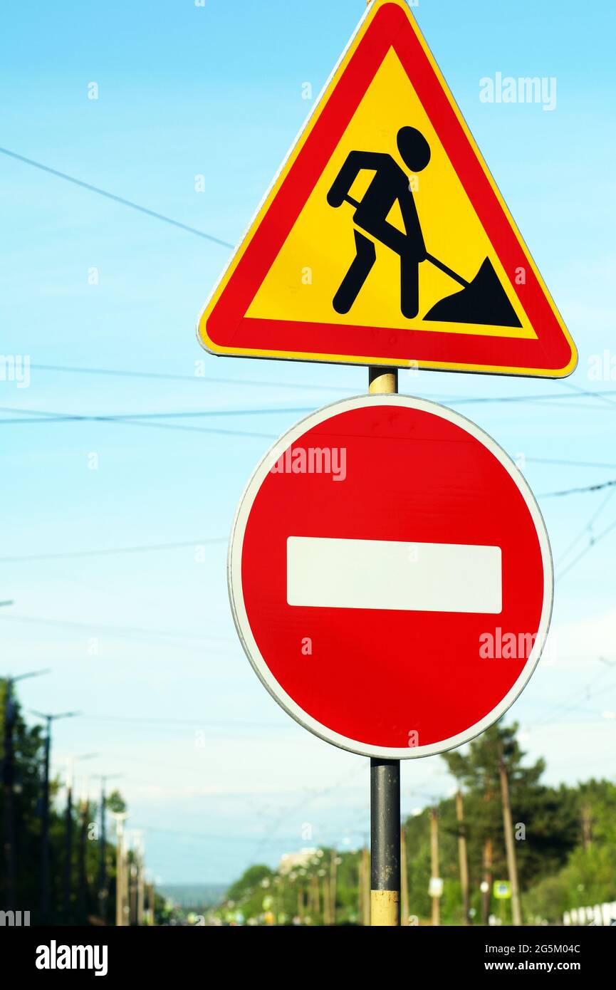 Road repair signs and bricks stand on the roadway Stock Photo - Alamy