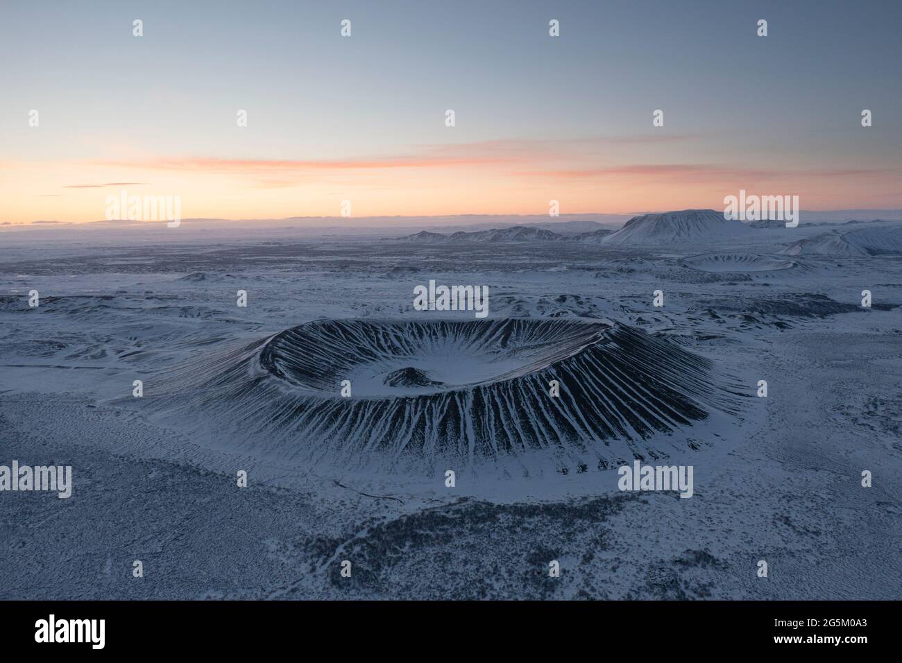 Hverfjall volcano crater from aerial view at sunrise Stock Photo - Alamy