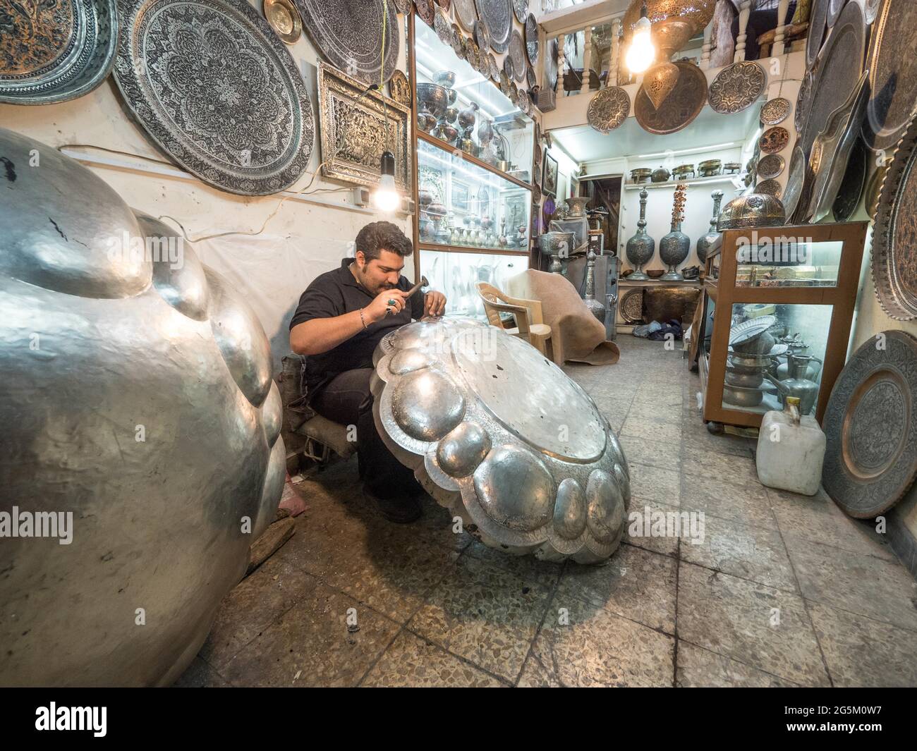 Craftsman with silver work in the bazaar, Meydan-e Naqsh-e (Jahan ...