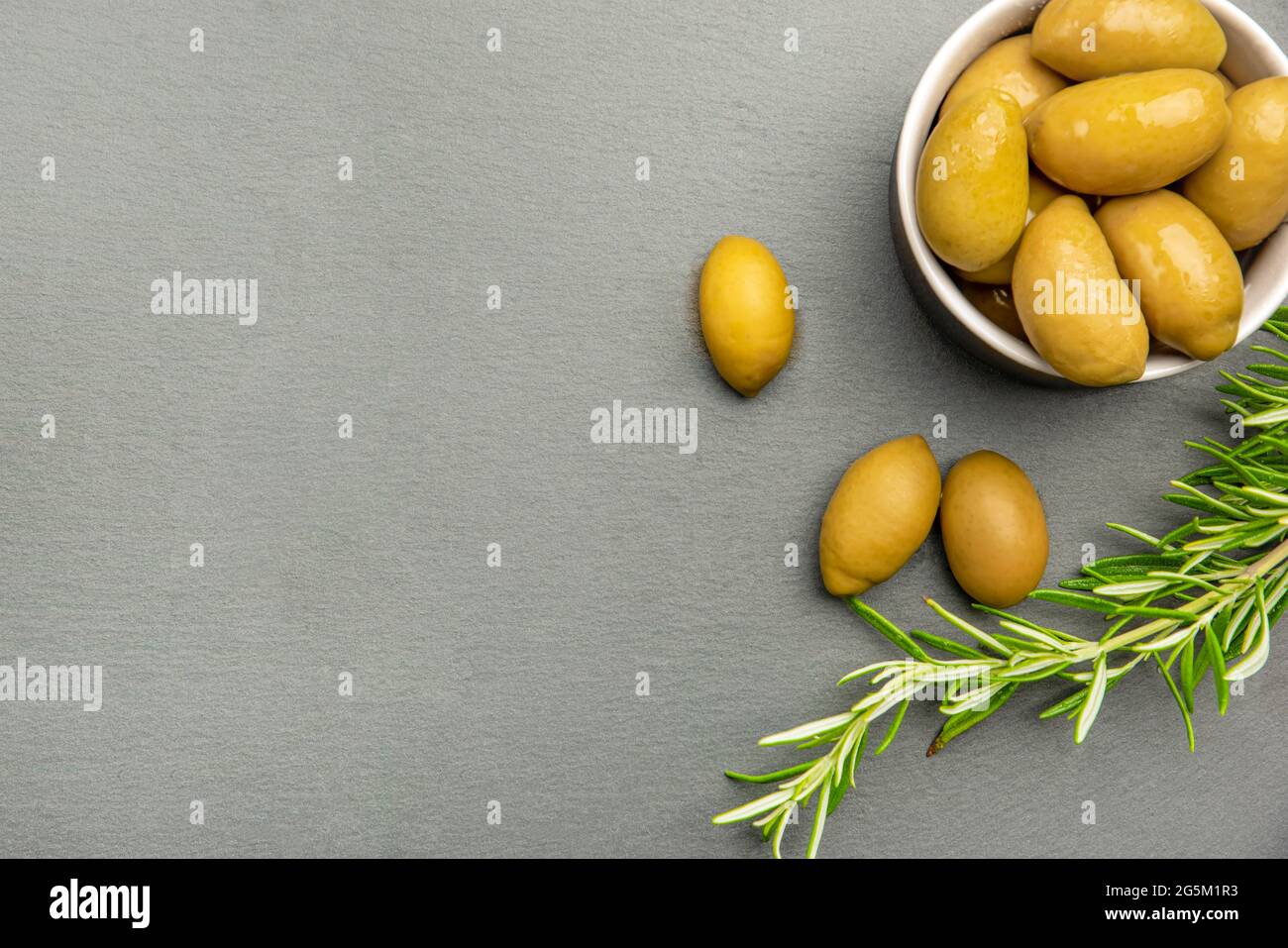 Green olives. Bella di cerignola Italian olives. Colored olives and a ...