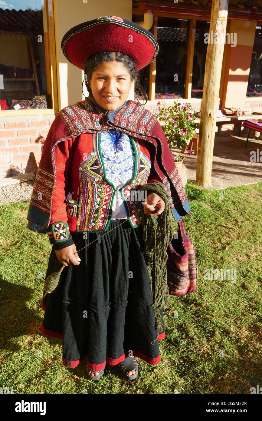 Indigenous young woman in traditional traditional costume, Chinchero ...