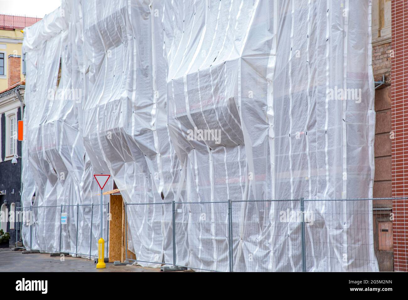 Building facade repair, house reconstruction renovation Stock Photo - Alamy