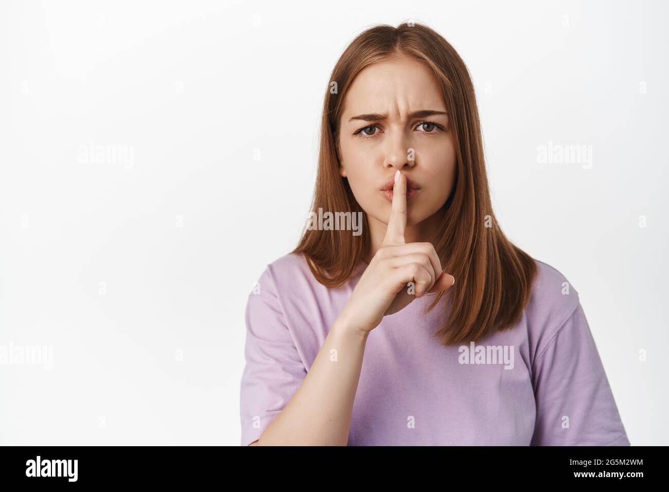 Girl hushing hi-res stock photography and images - Alamy