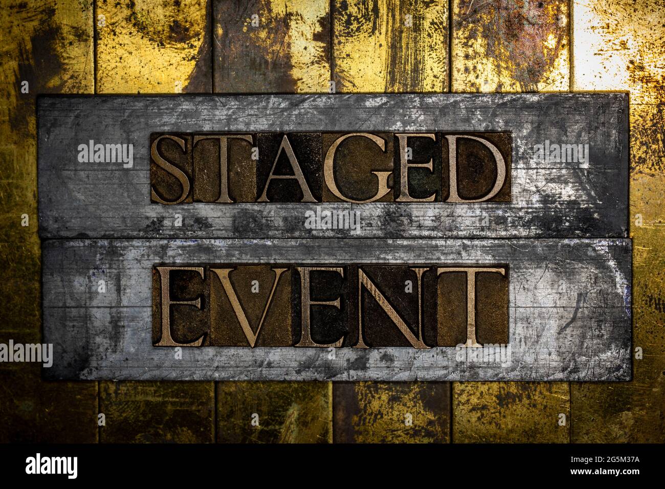 Staged Event text formed with real authentic typeset letters on vintage ...