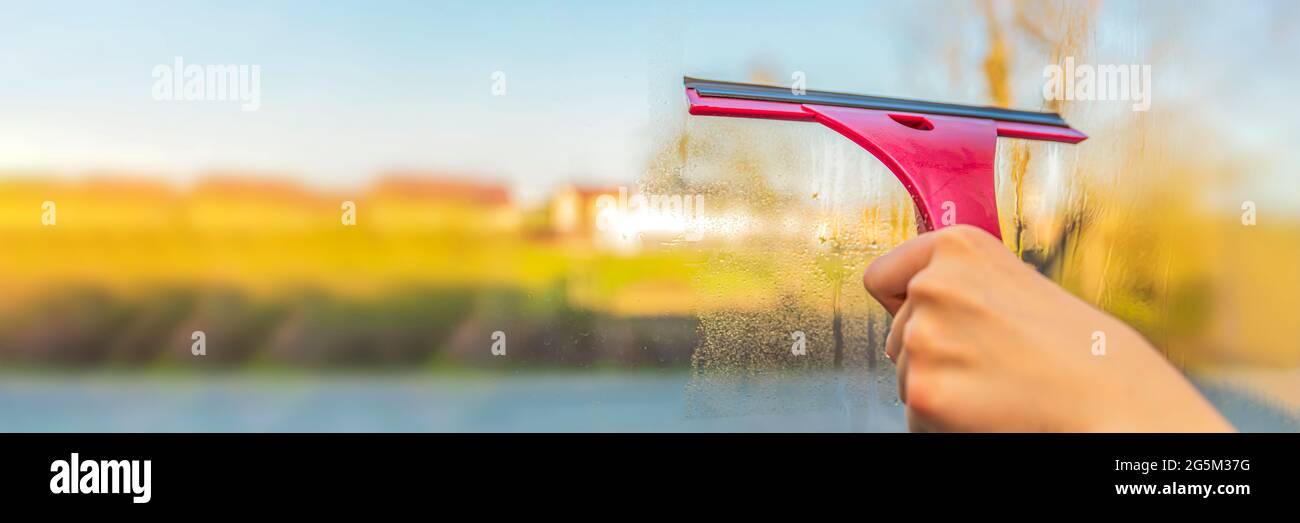 Person washing cleaning windows hi-res stock photography and images - Alamy