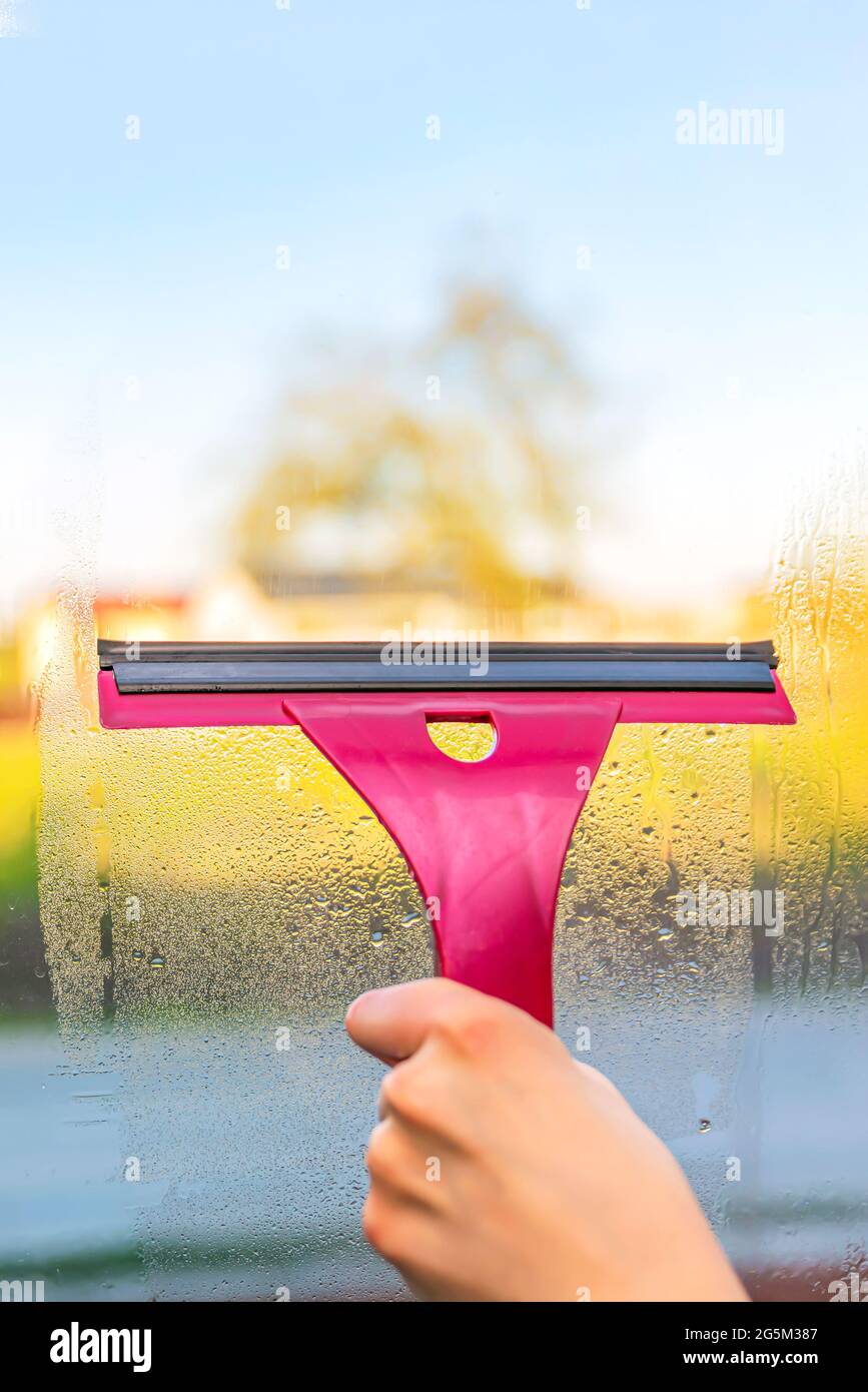 Person washing cleaning windows hi-res stock photography and images - Alamy