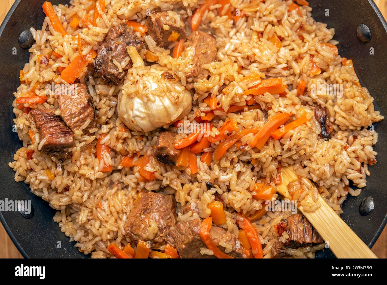 Pilaf close-up. Oriental cuisine concept. National Uzbek pilaf with ...