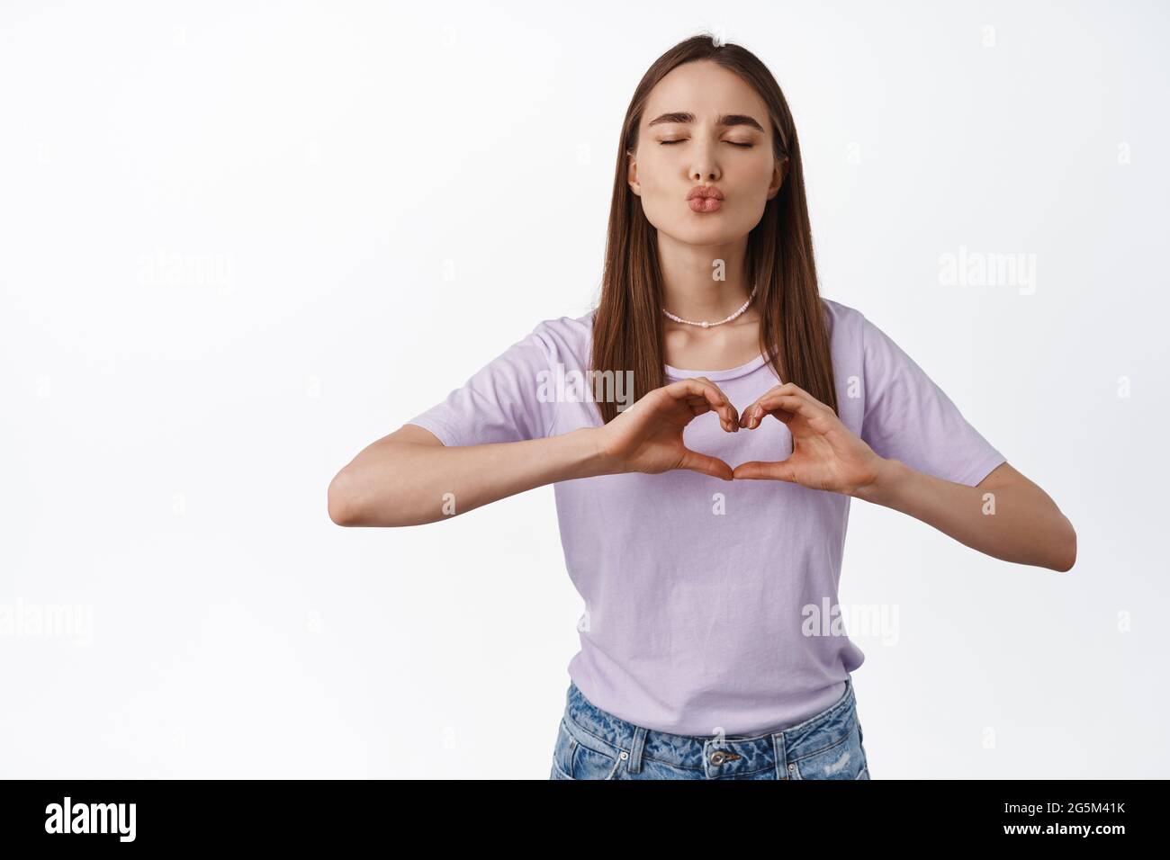 Happy pride love is love. Smiling cute woman kissing and showing heart ...