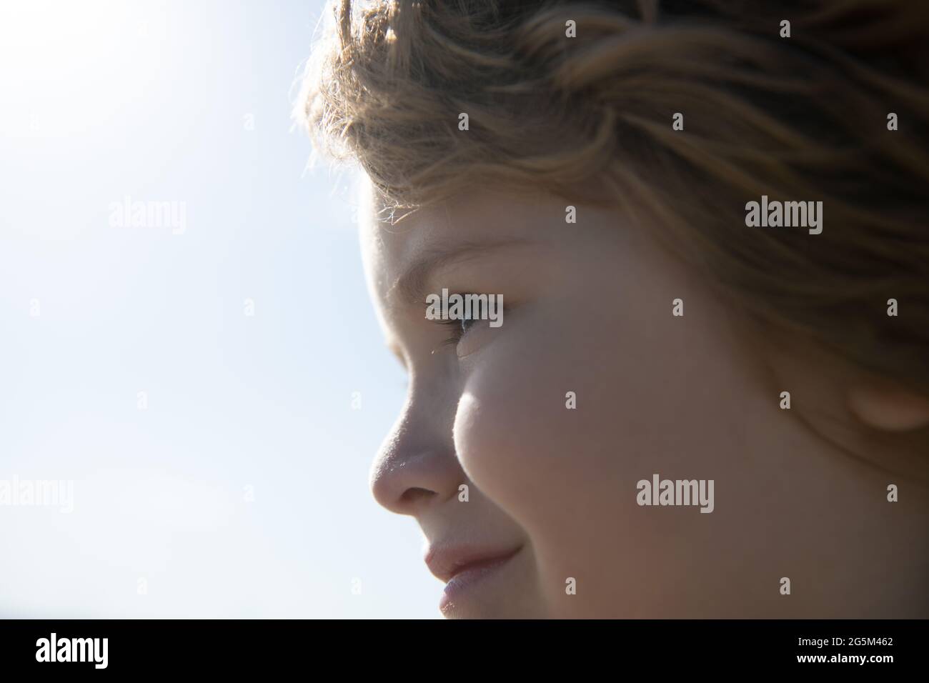 Funny child face close up. Kids head profile portrait Stock Photo - Alamy