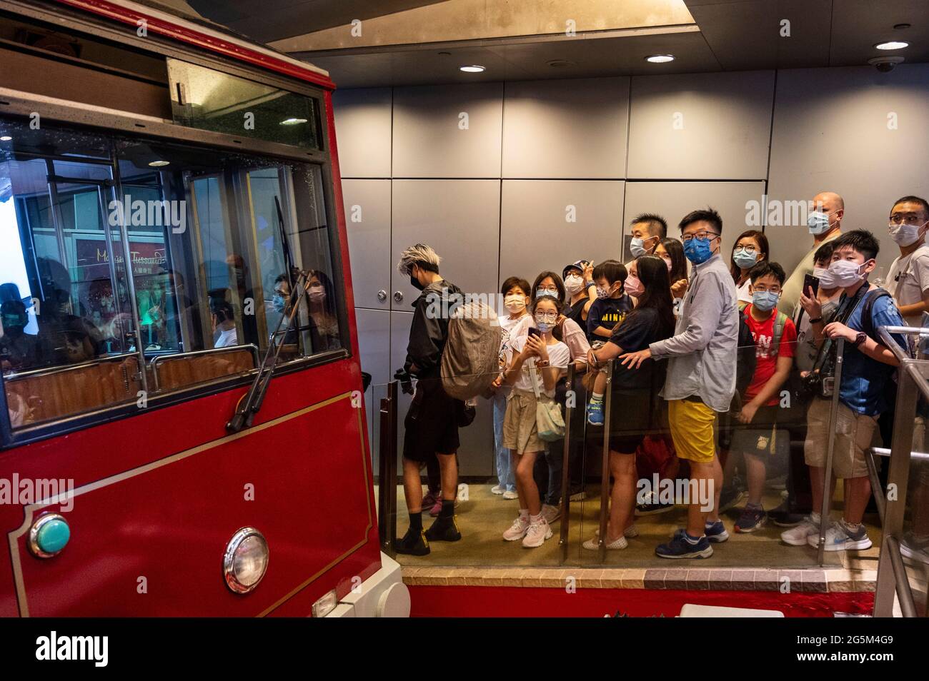 Hong Kong, China. 27th June, 2021. Passengers queue in line to enjoy ...