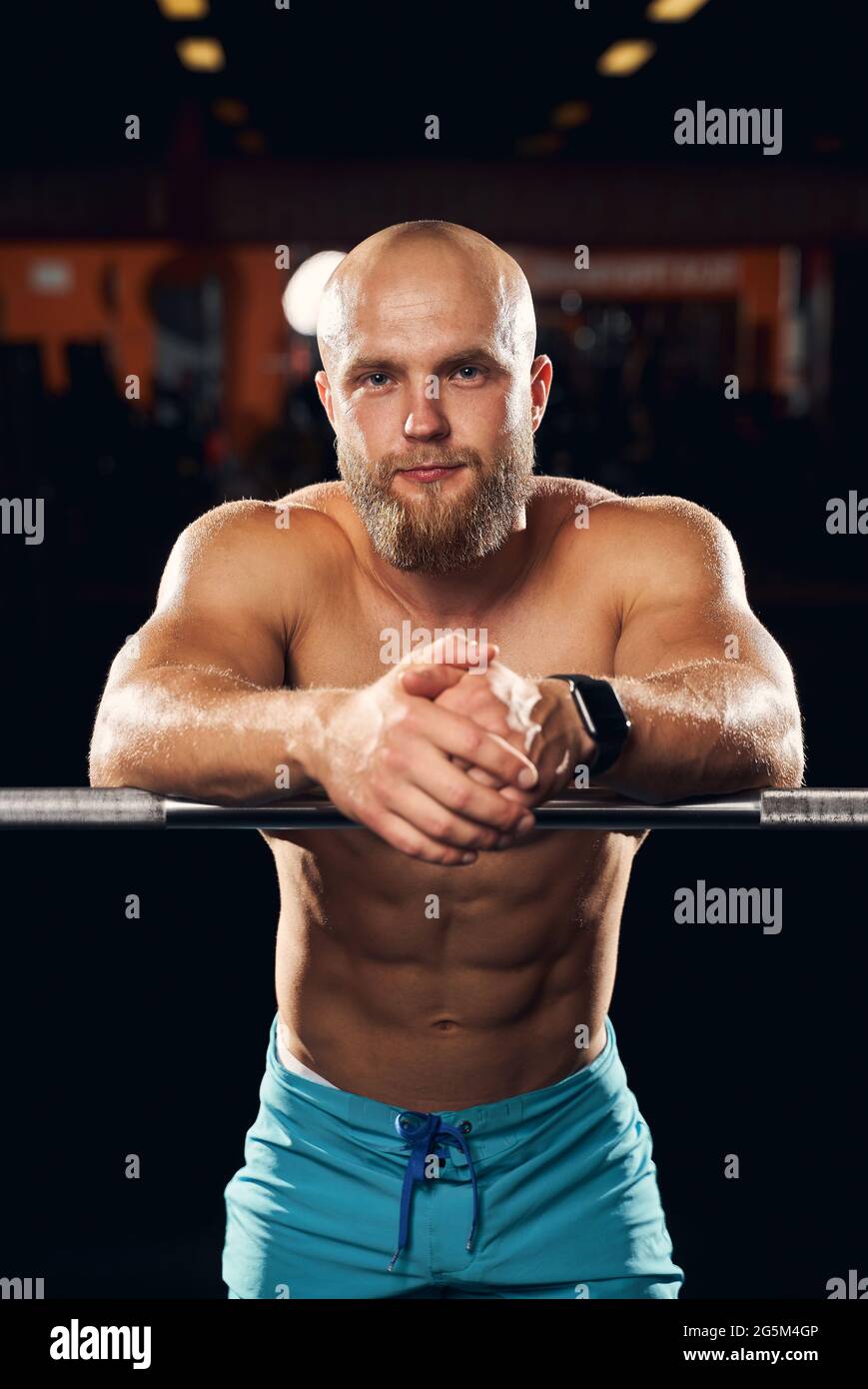 Muscular male athlete posing hi-res stock photography and images - Alamy