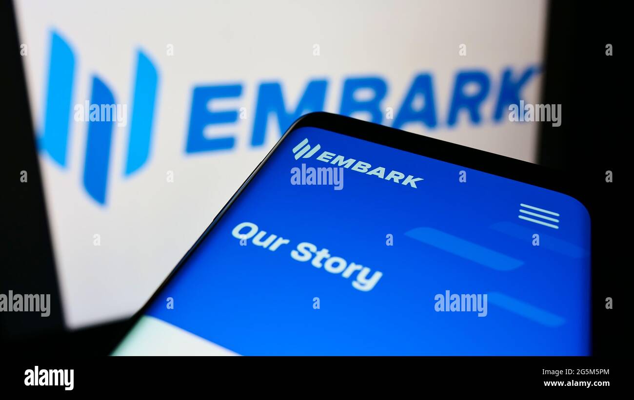 Cellphone with webpage of US autonomous driving company Embark Trucks ...