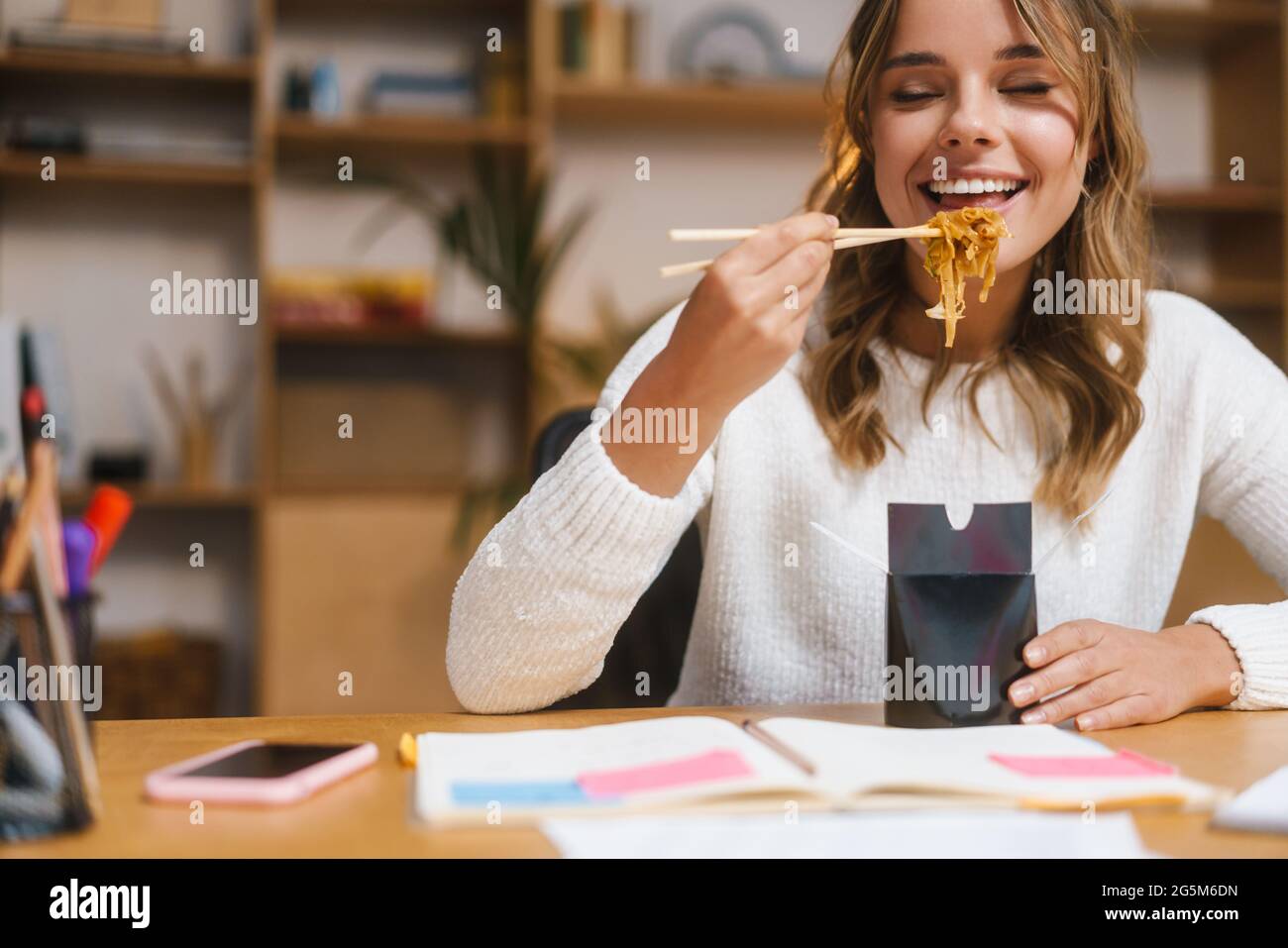 Noodle box woman hi-res stock photography and images - Alamy