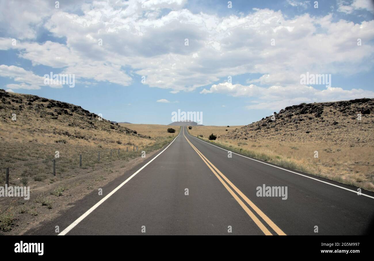 Endless highway in peaceful rural scene Stock Photo - Alamy
