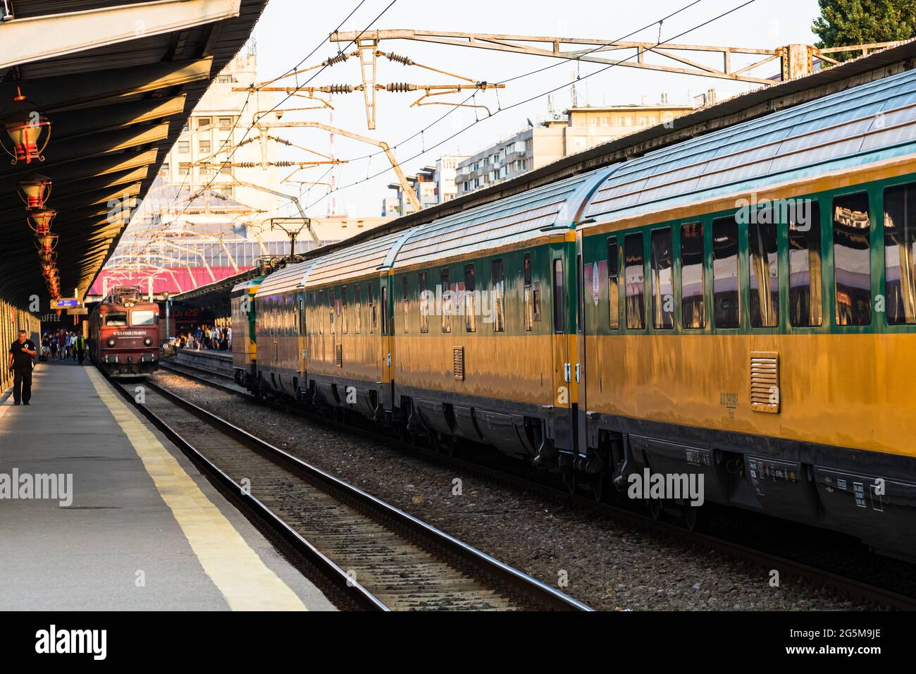 Detail of train in motion at train platform at Bucharest North Railway ...