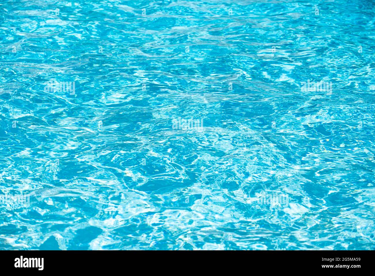 Abstract ripple wave and clear turquoise water surface in swimming pool ...