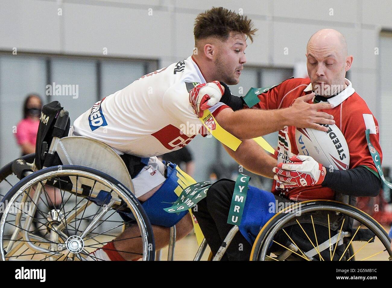 Sheffield, England - 26 June 2021 -Tom Halliwell of England tackles ...