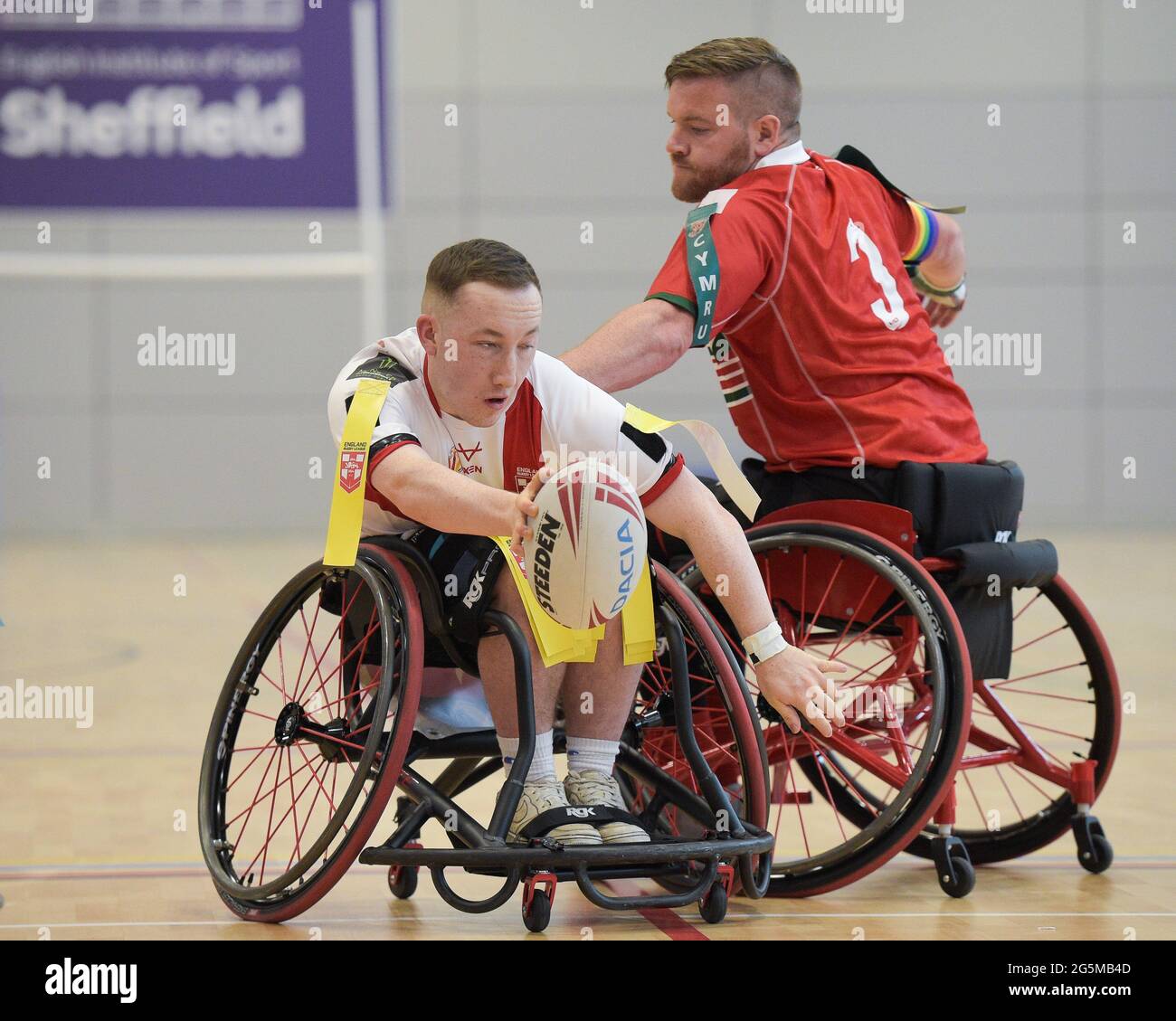 Sheffield, England - 26 June 2021 - Nathan Collins of England evades ...