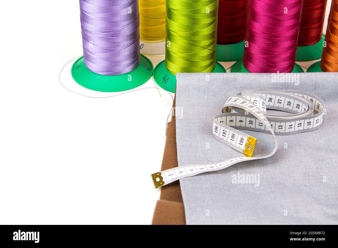 Pieces of cloth and thread. Tailoring, manufacture of upholstered ...