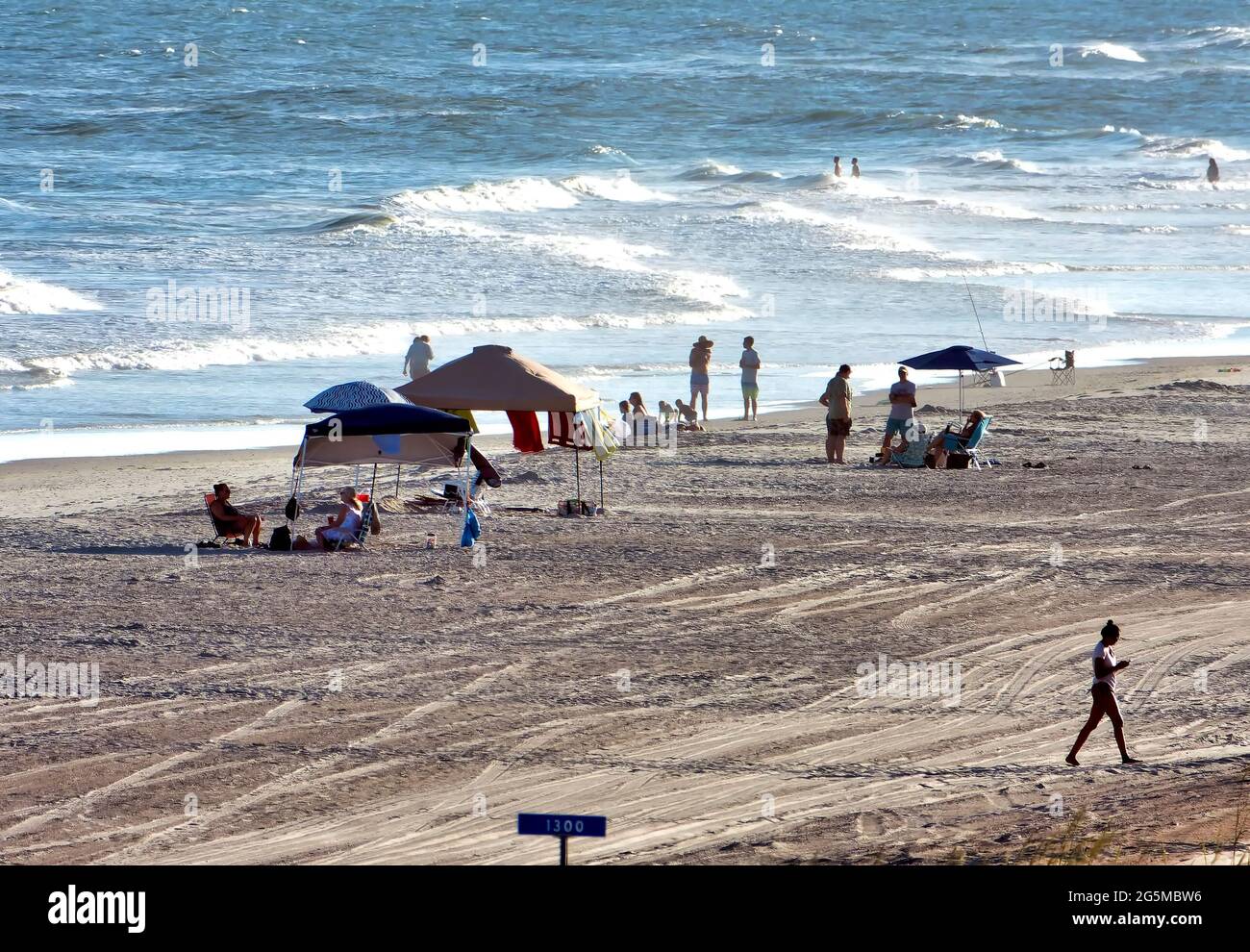 Setting up beach tents hi-res stock photography and images - Alamy