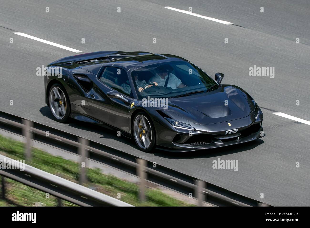 2021 grey Ferrari Spider 7 speed semi-auto 3902 cc driving on the M6 ...