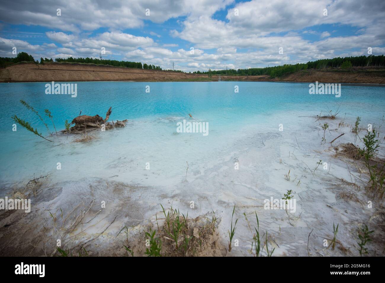 Badlands. Alkaline solution. Ash dump dumping waste into the water ...