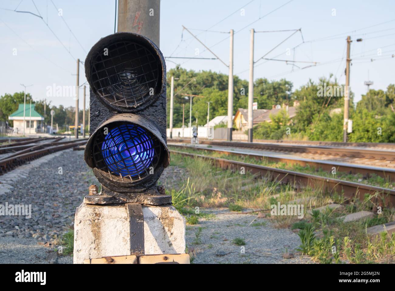 Railroad signal with blue light with a railroad junction. Train blue ...
