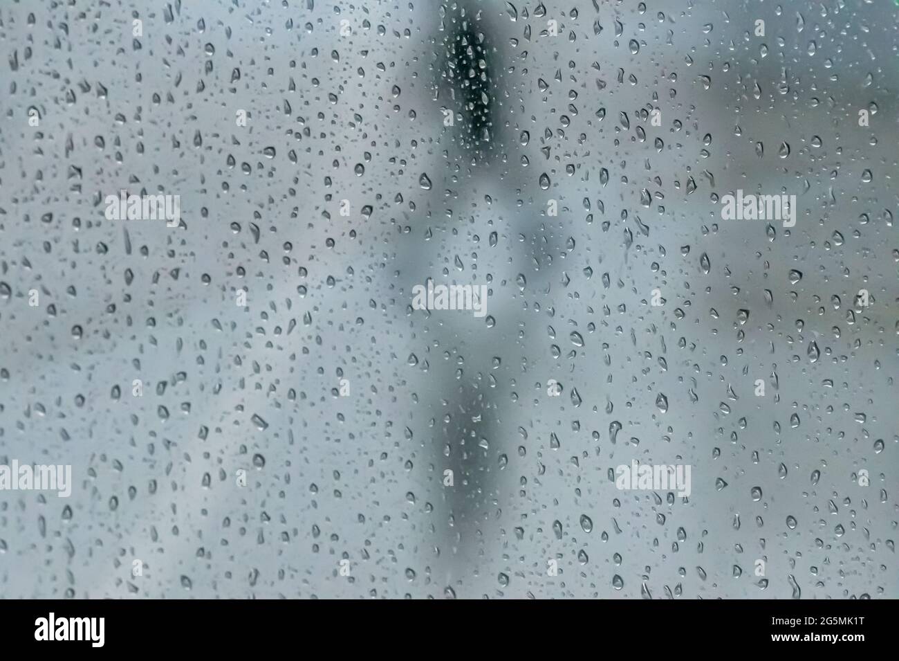 Closeup shot of a wet glass surface Stock Photo - Alamy