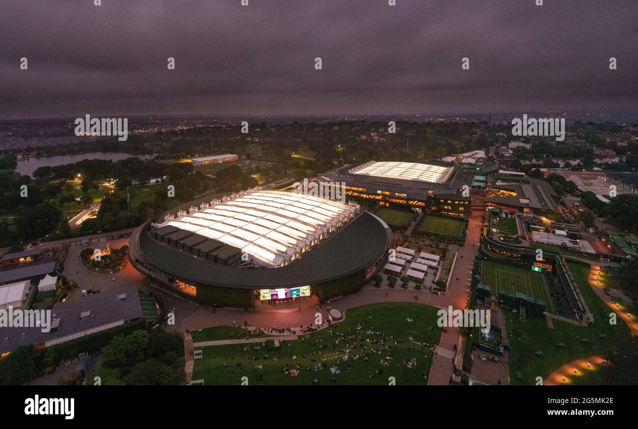 Aerial view across the grounds at night with play continuing on Centre ...