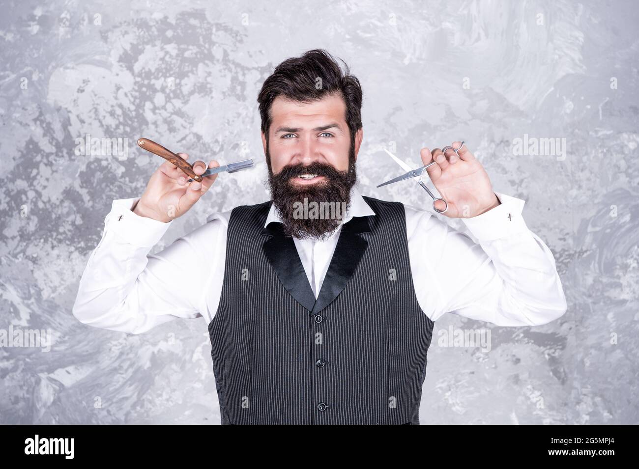 old fashioned barbershop. male grooming. handsome barber with retro ...