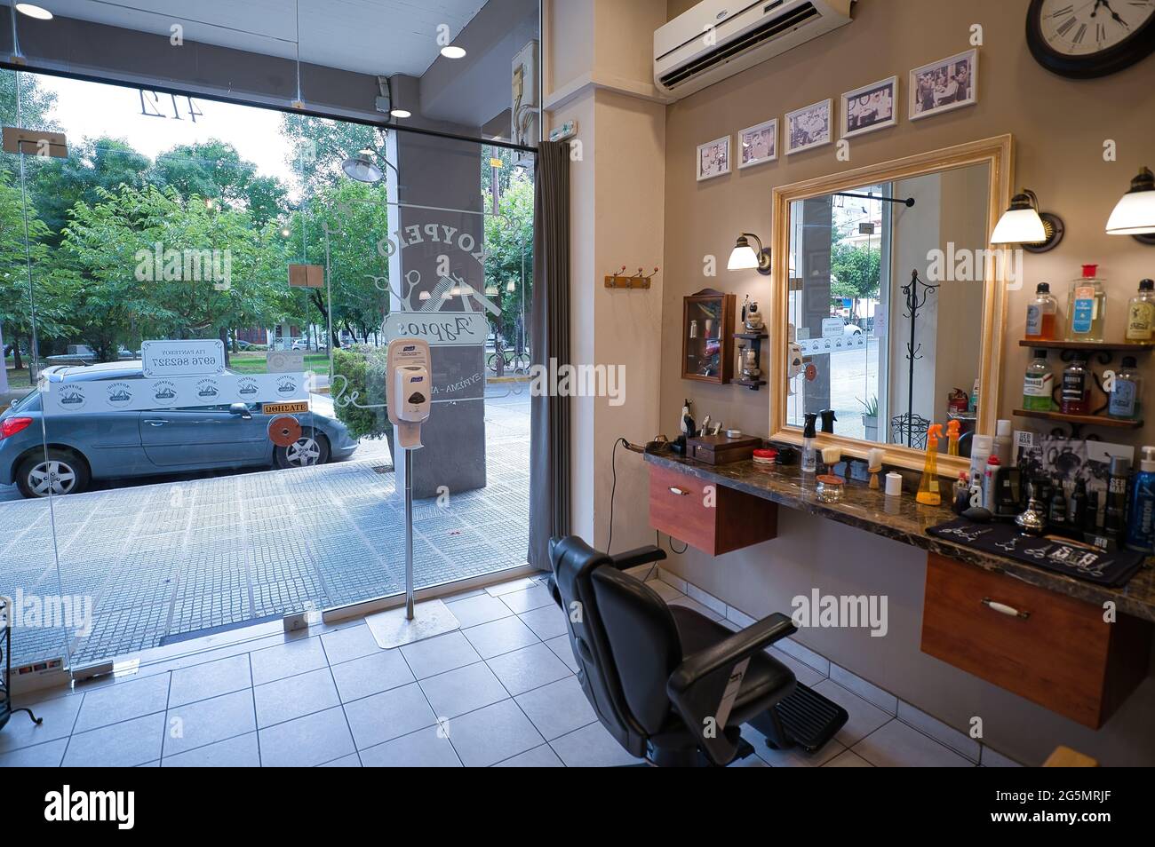 VOLOS, GREECE - Jun 25, 2021: Men's barber shop, retro styled interior ...