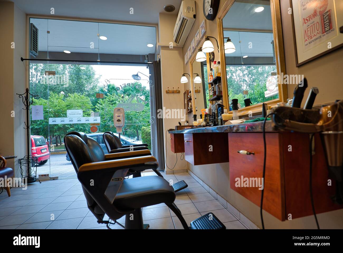 VOLOS, GREECE - Jun 25, 2021: Men's barber shop, retro styled interior ...
