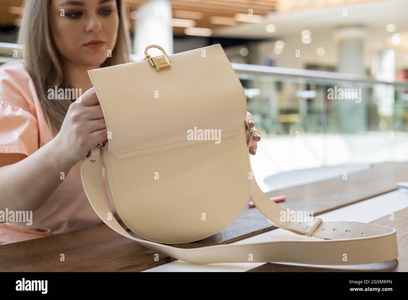 Top view business female hands pulling out pink notepad diary pen ready ...