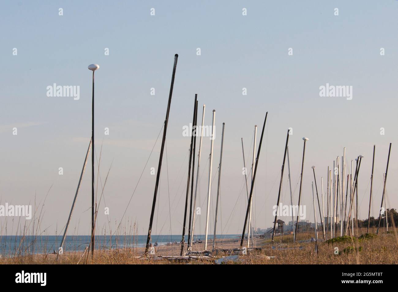Sailing masts on beach hi-res stock photography and images - Alamy