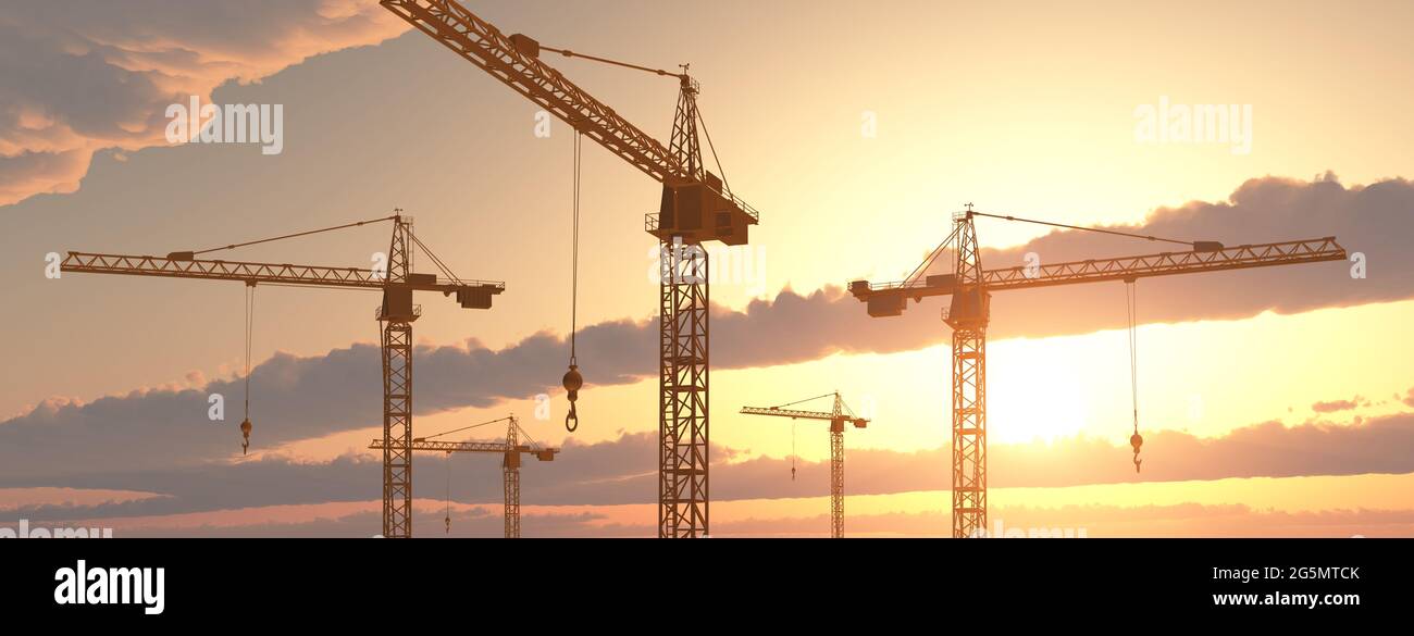 Construction cranes at sunset Stock Photo - Alamy