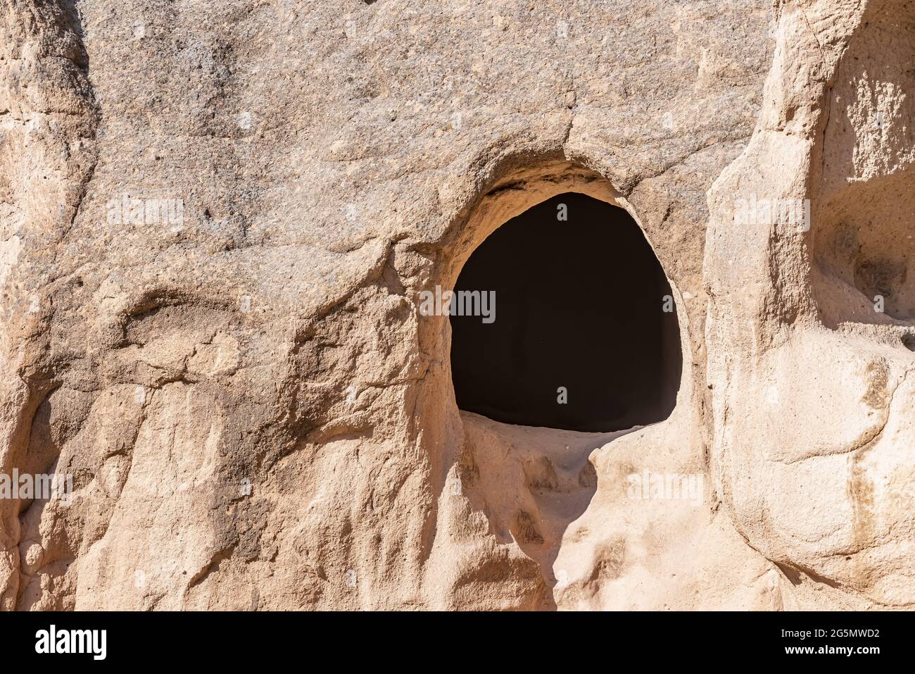 Closeup shot of a hole on a stone formation in Zelve valley, Turkey ...