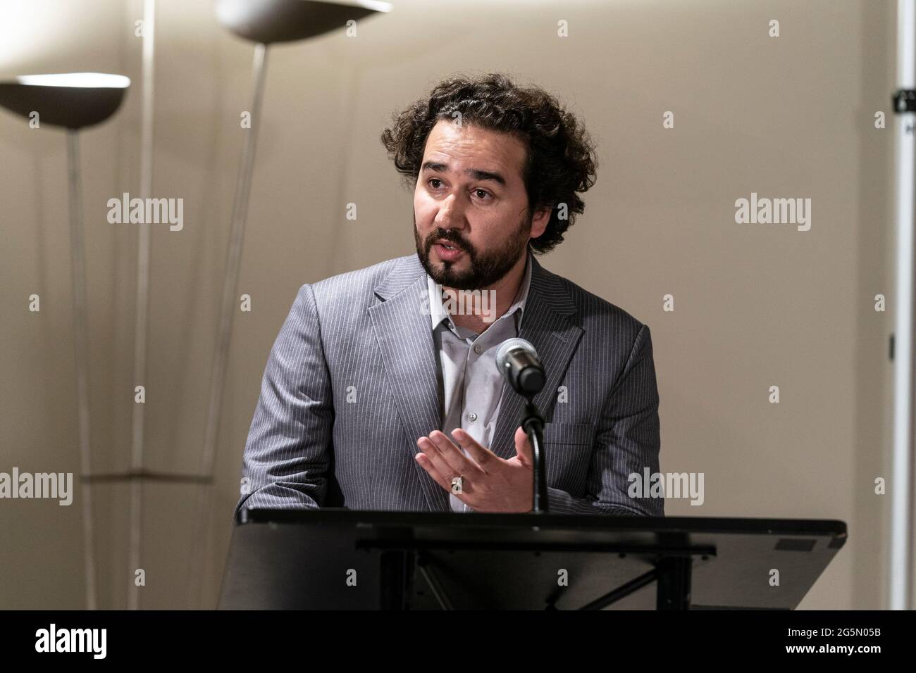 New York, United States. 28th June, 2021. Omaid Sharifi speaks at ...