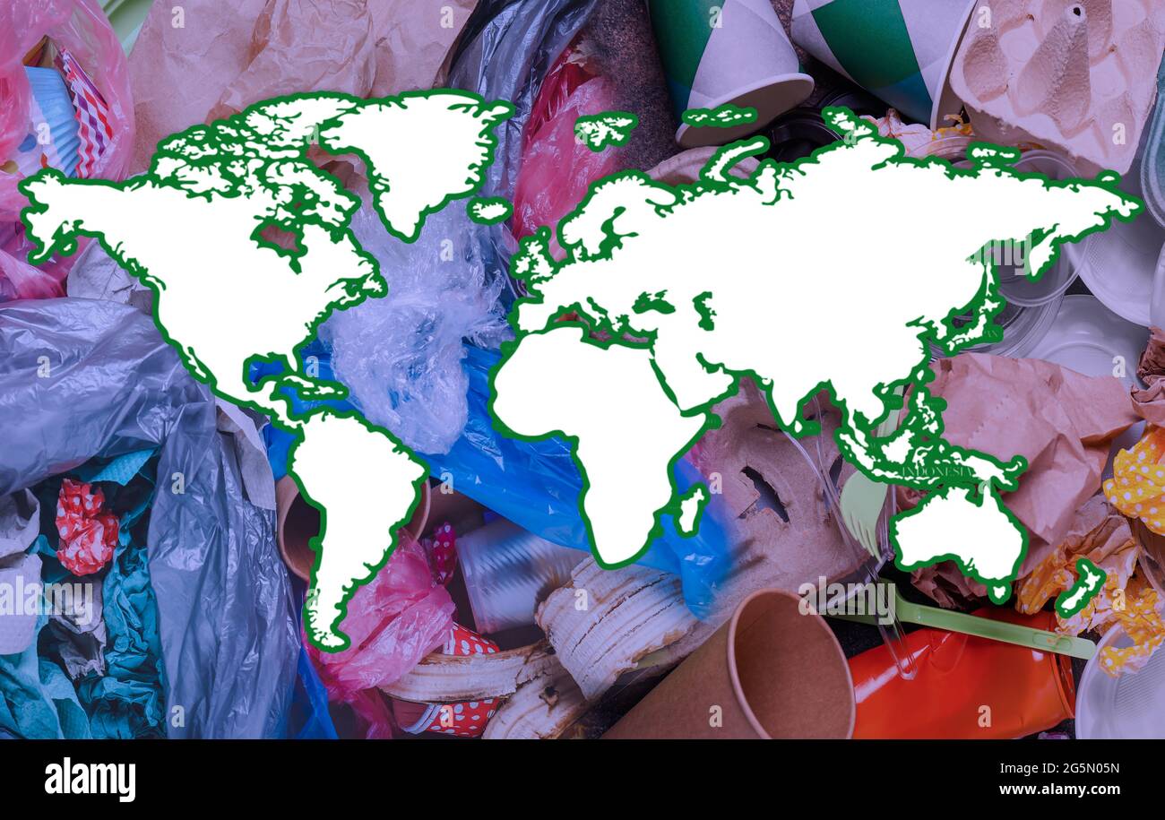 World map and heap of garbage. Recycling concept Stock Photo - Alamy