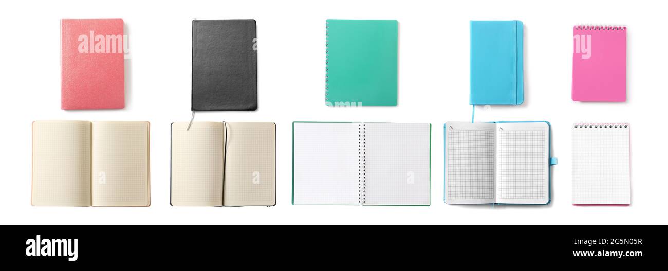 Different notebooks on white background Stock Photo - Alamy