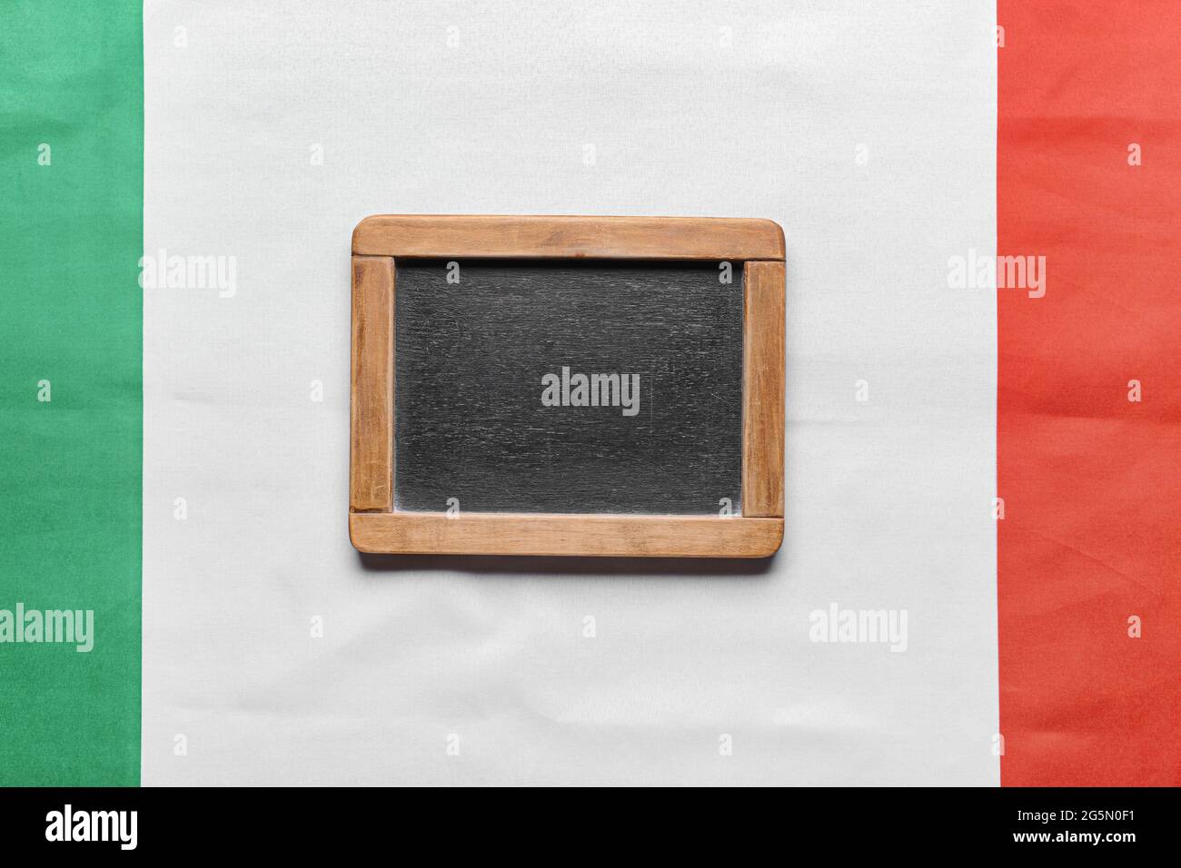 Empty chalkboard on Italian flag Stock Photo - Alamy