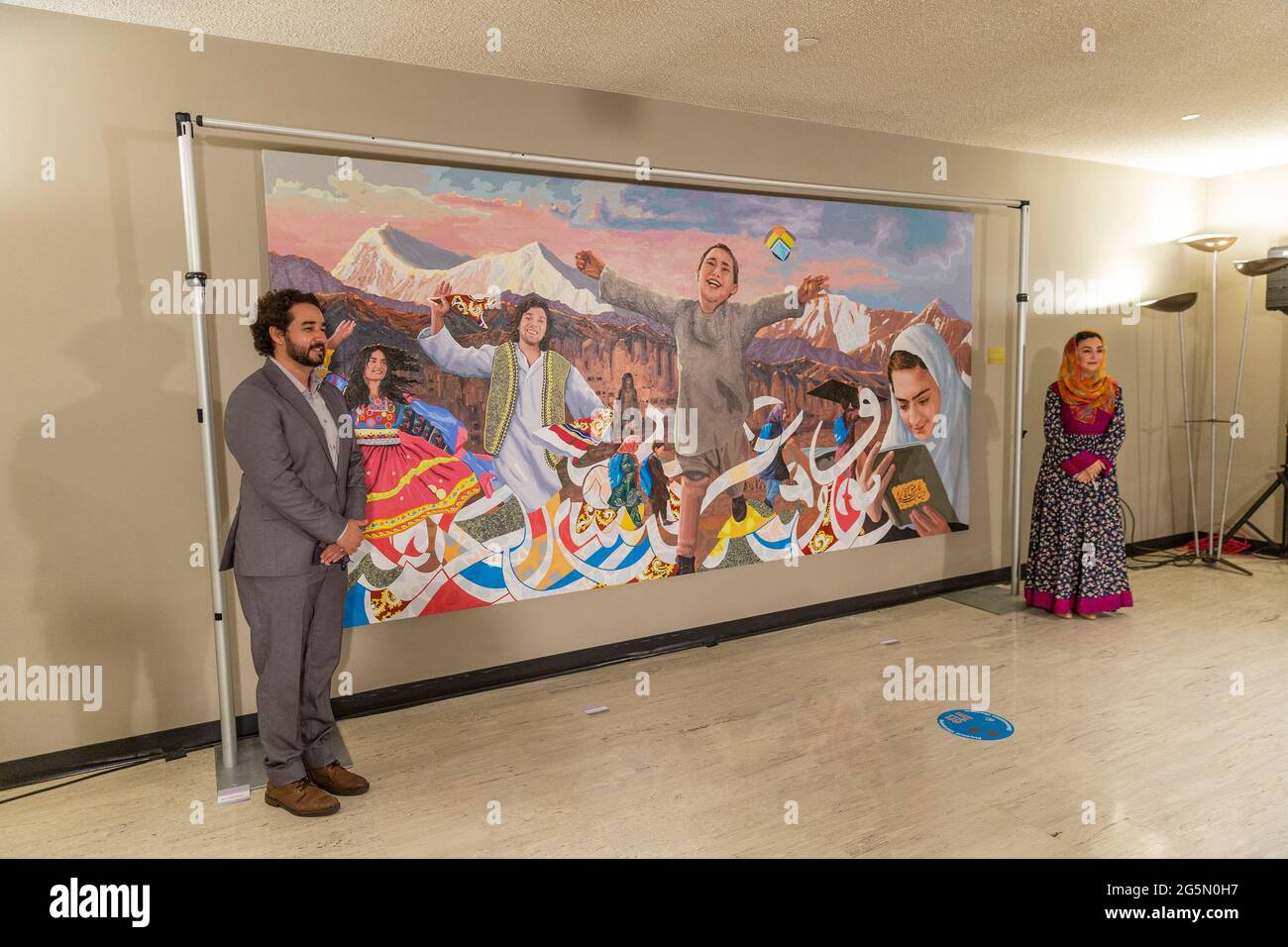 Omaid Shafiri and Ambassador Adela Raz attend unveiling ceremony for ...