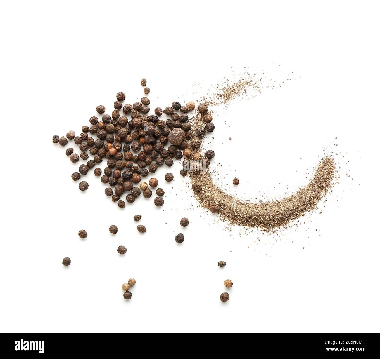 Black peppercorns and powder on white background Stock Photo - Alamy