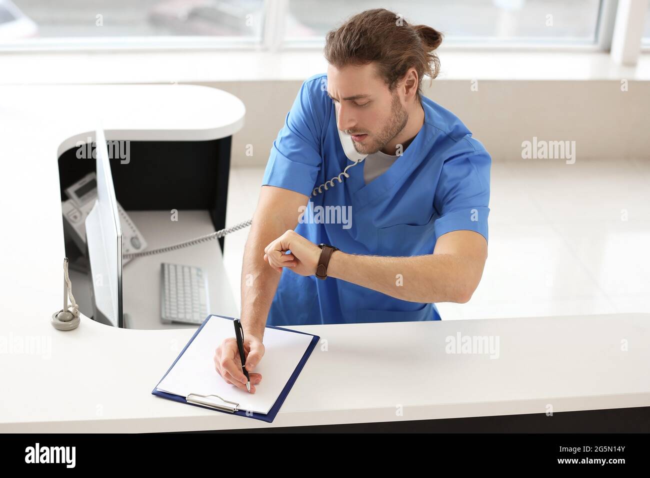 Admitting talking hi-res stock photography and images - Alamy