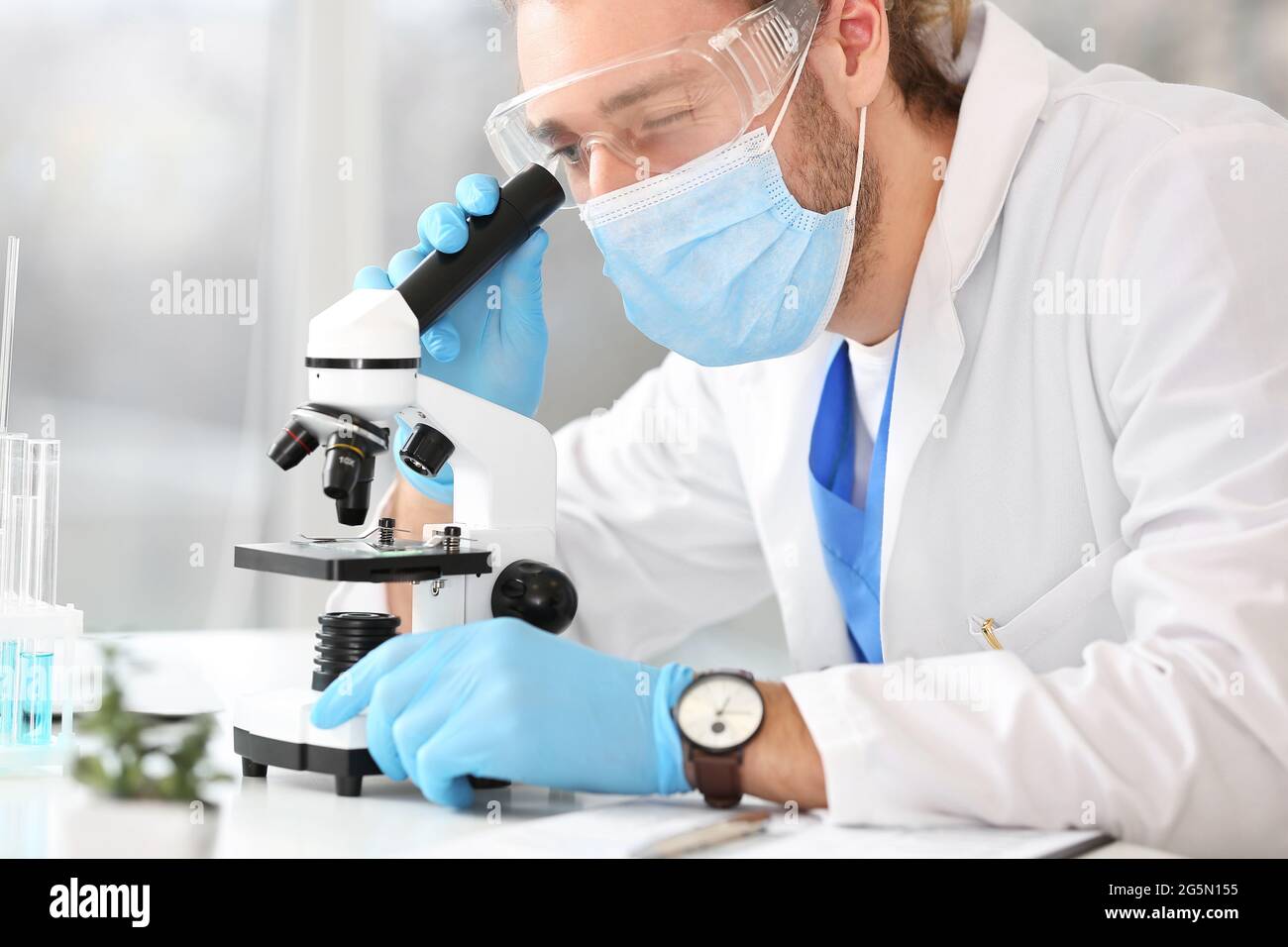 Male scientist working in laboratory Stock Photo - Alamy