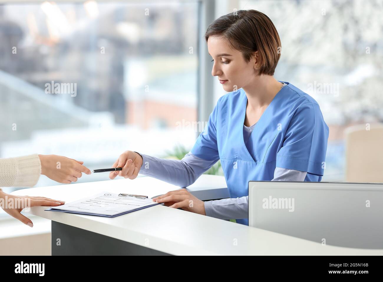Young patient in emergency department hi-res stock photography and ...