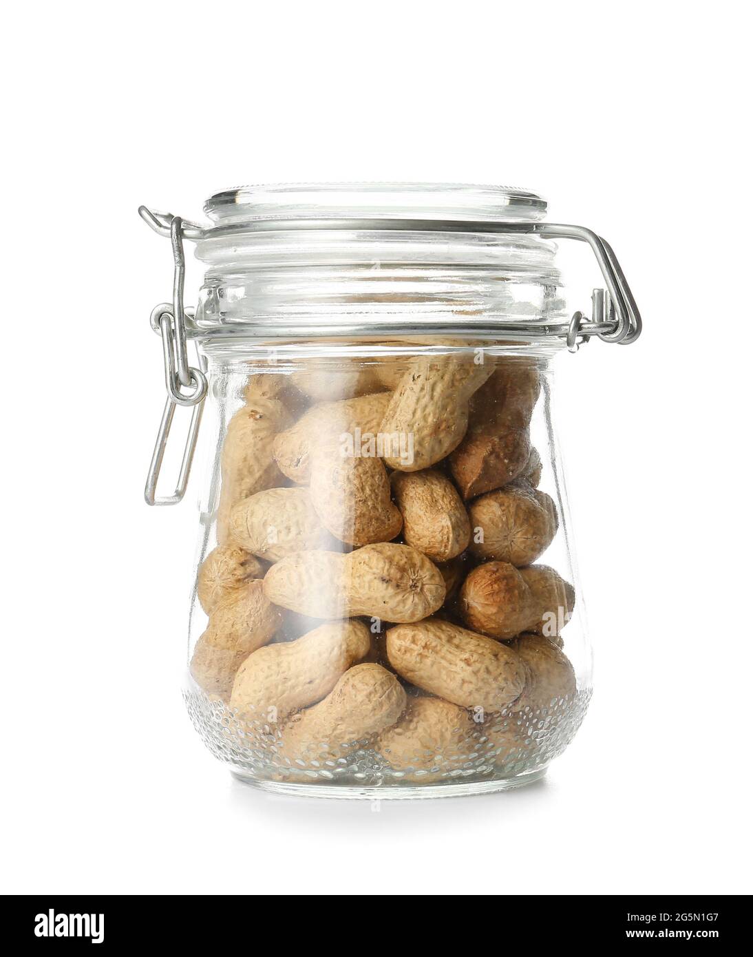 Glass jar with peanuts on white background Stock Photo - Alamy