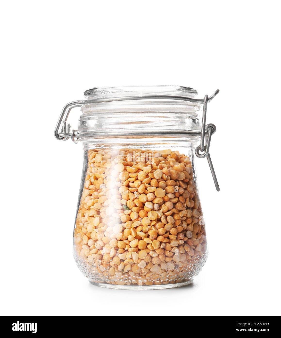 Glass jar with dry split peas on white background Stock Photo - Alamy